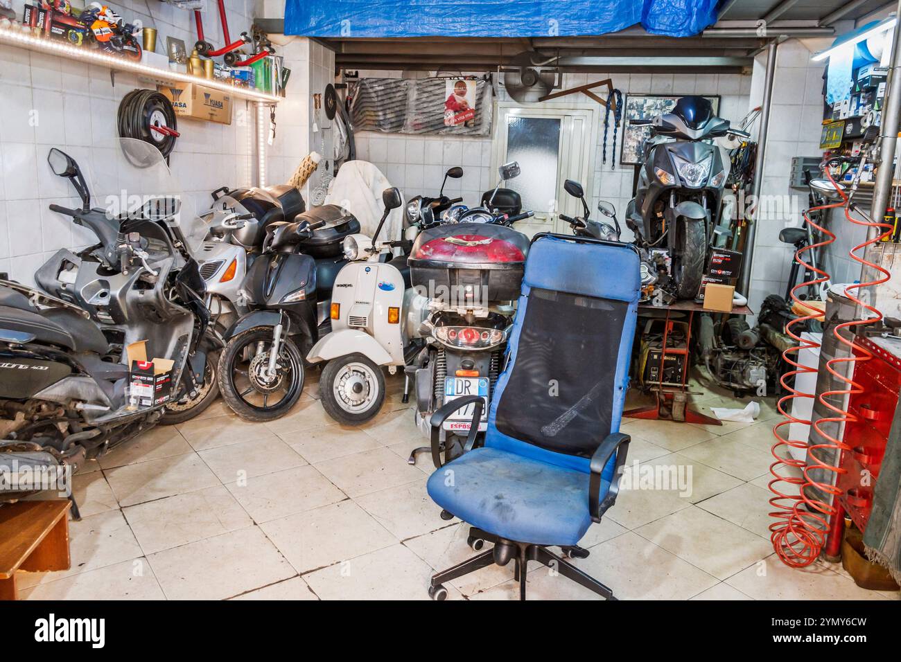 Vespa workshop interior hi-res stock photography and images - Alamy