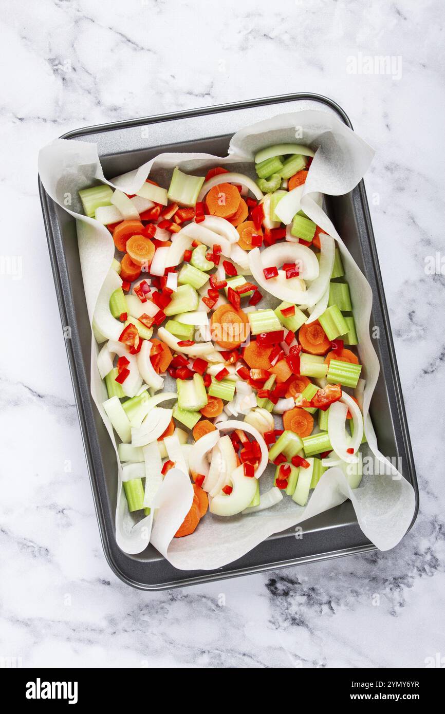 Raw, chopped vegetables in a basket, ingredients for making ossobuco ...