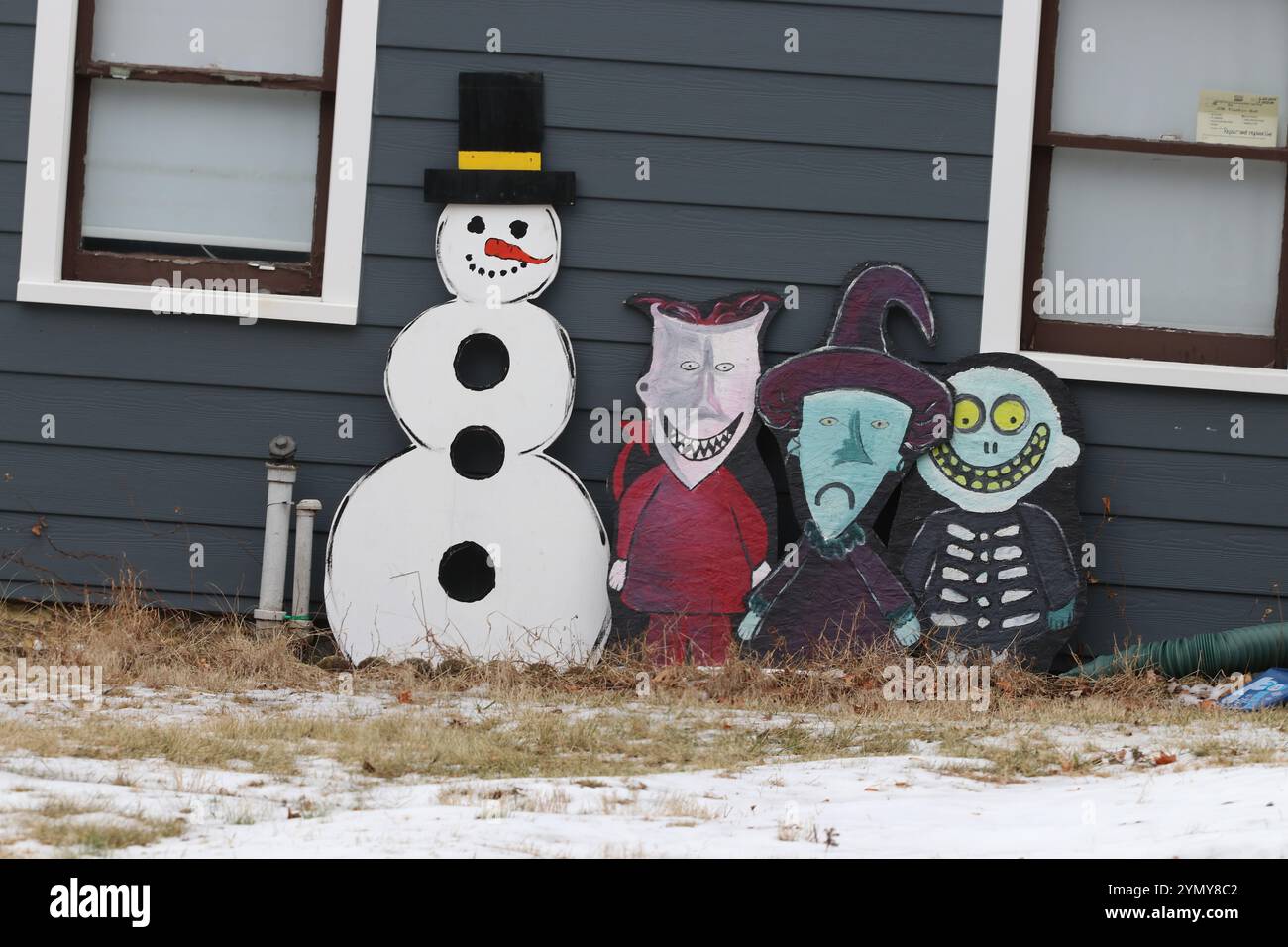 Yard display featuring a snowman and three Nightmare Before Christmas ...