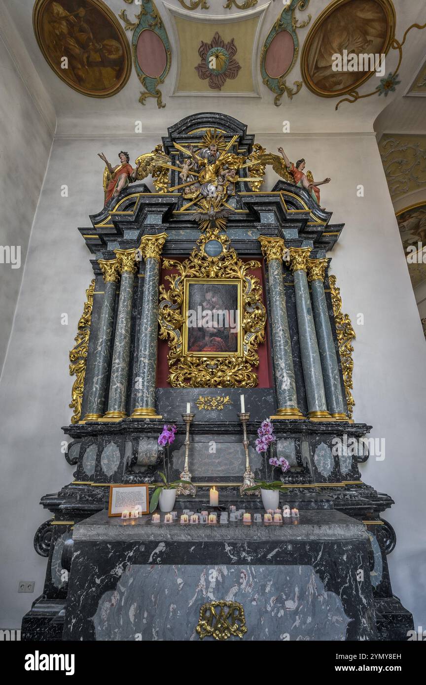 Side altar with sacrificial candles, Former collegiate church of St ...