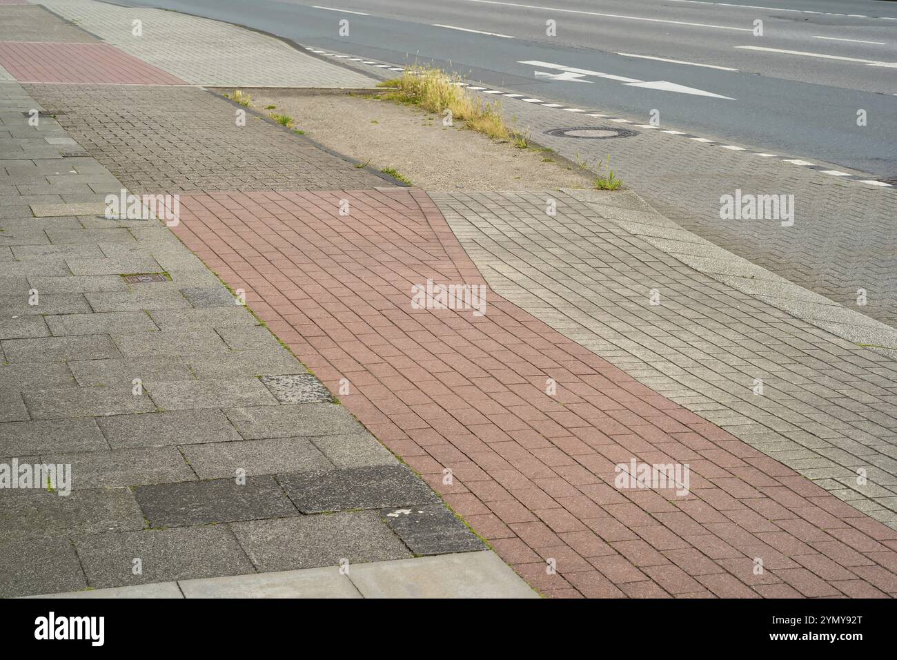 Street, sidewalk, bike path with traffic signs Stock Photo - Alamy