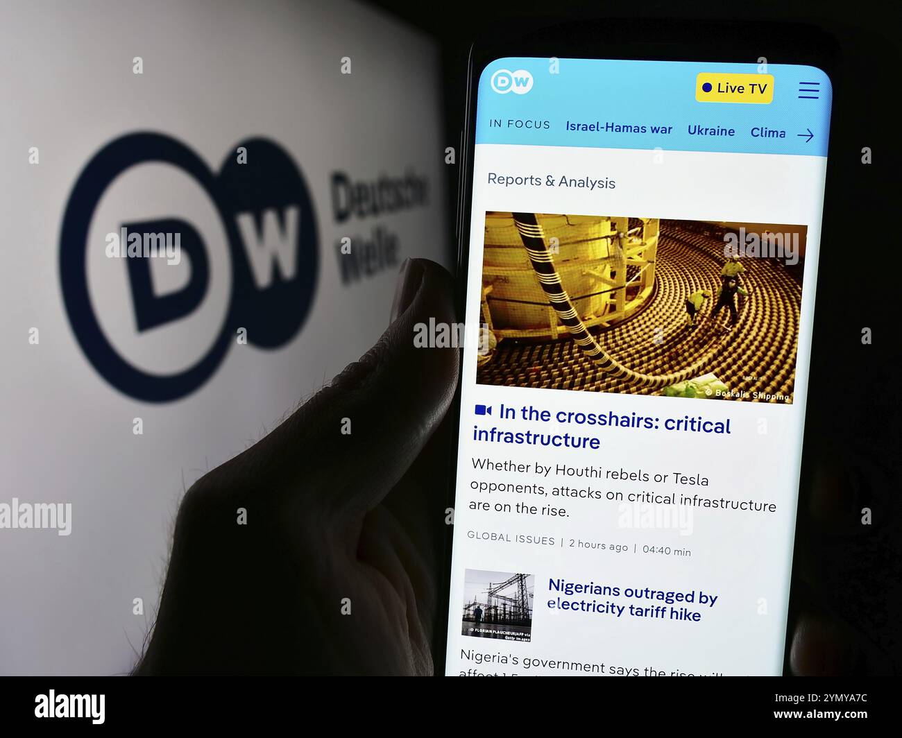 Stuttgart, Germany, 04-10-2024: Person holding cellphone with webpage ...