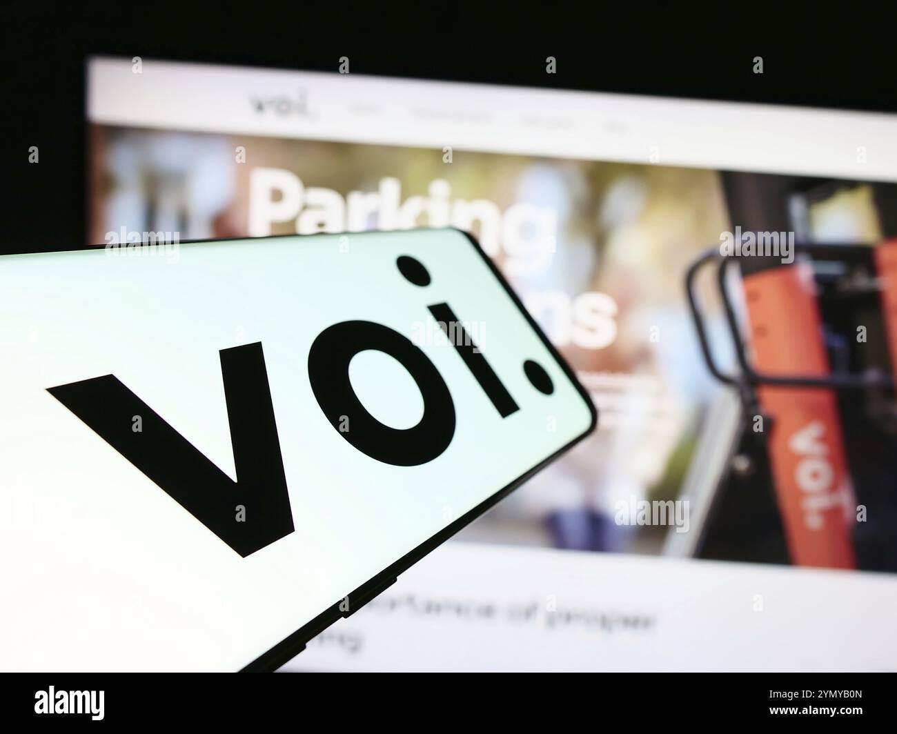 Stuttgart, Germany, 05-14-2024: Smartphone with logo of Swedish electric scooter company Voi ...