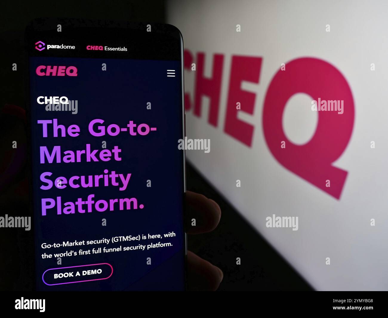 Stuttgart, Germany, 05-07-2024: Person holding smartphone with web page of US cybersecurity ...