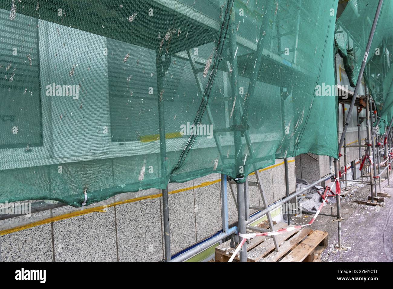 House construction site covered with a tarpaulin Stock Photo - Alamy