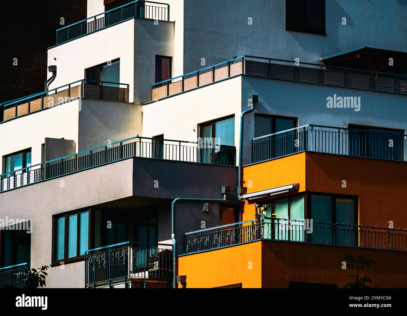Urban Residential Facade with Vibrant Balconies and Minimalist Design ...