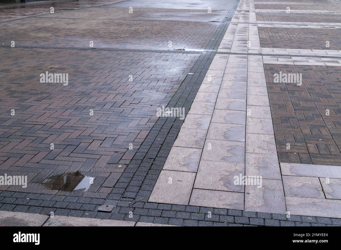 Paved deserted pedestrian zone in the city centre Stock Photo - Alamy