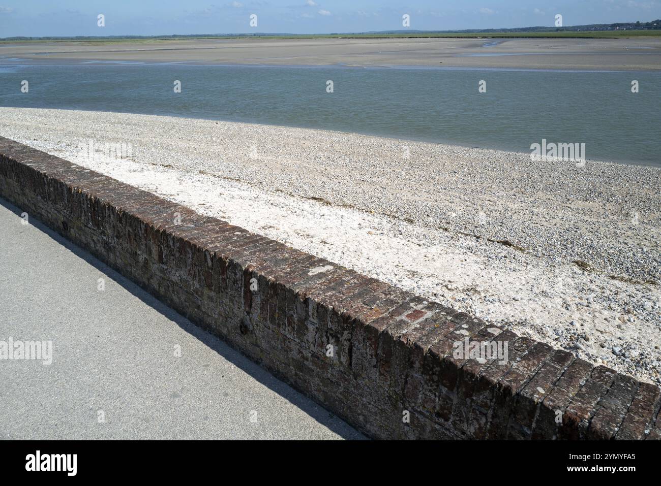 Brick wall on the coast road Le Crotoy North France Stock Photo - Alamy
