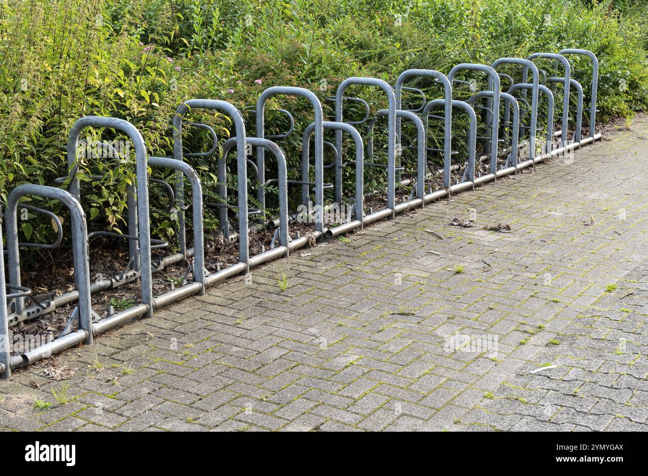 Row of bicycle stands hi-res stock photography and images - Alamy
