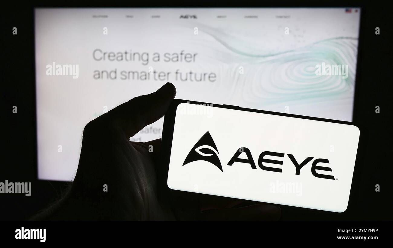 Stuttgart, Germany, 05-02-2024: Person holding smartphone with logo of US lidar software company ...