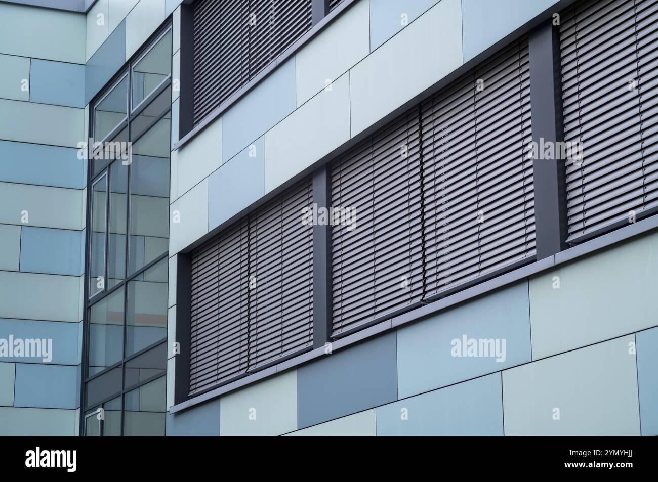 Office building facade with windows and blinds Stock Photo - Alamy