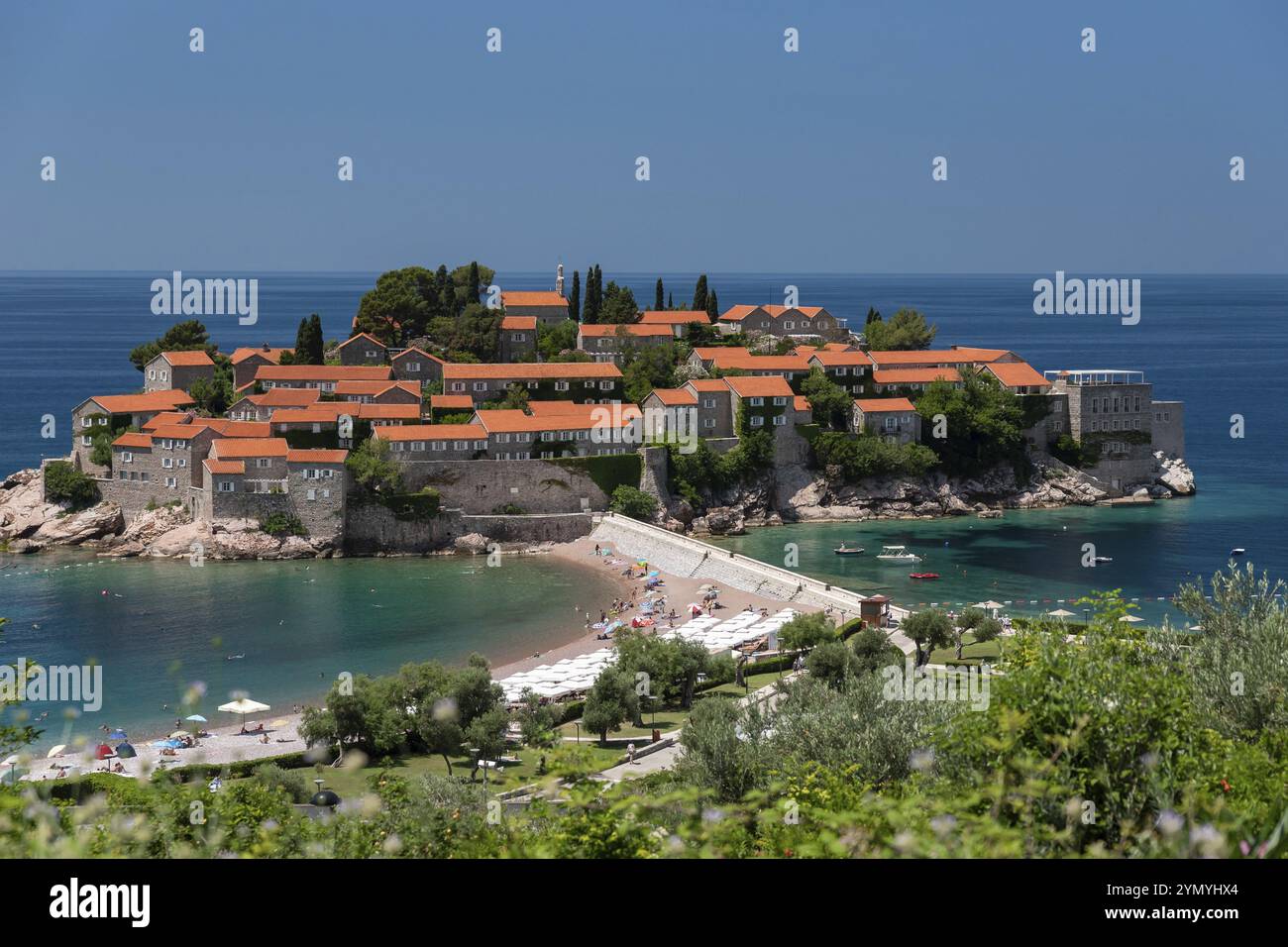 Sveti Stefan island during beautiful summer day, Montenegro Stock Photo ...