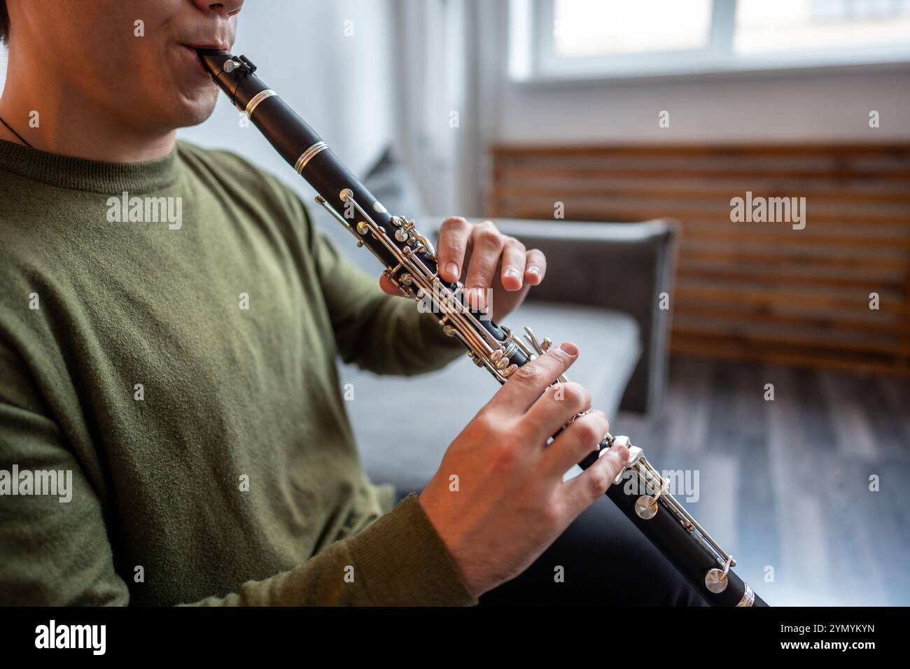 Clarinet player. Clarinetist hands playing flute woodwind music ...