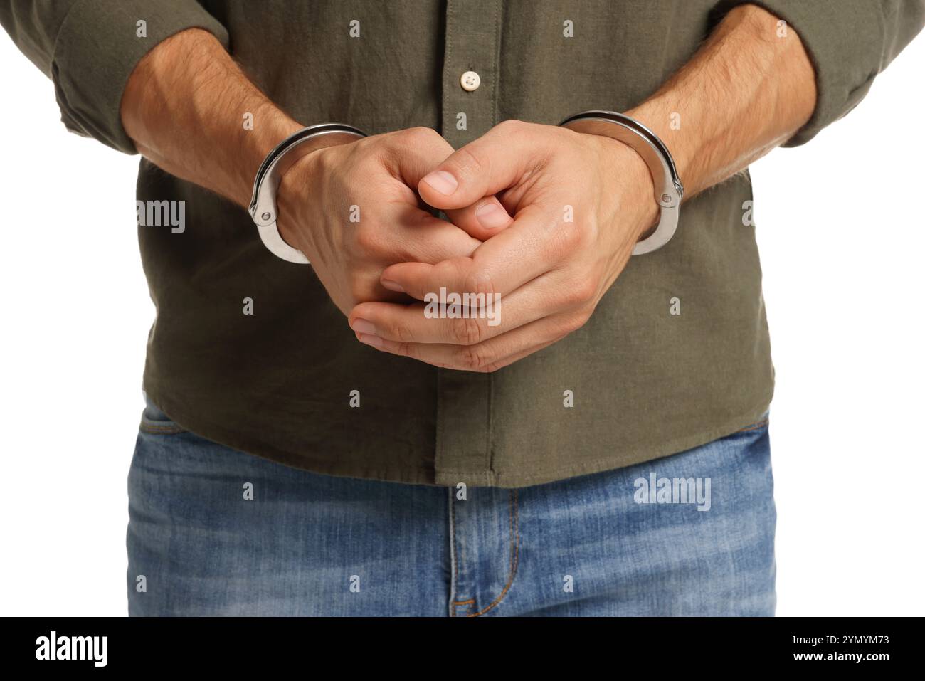 Man in metal handcuffs on white background, closeup Stock Photo - Alamy
