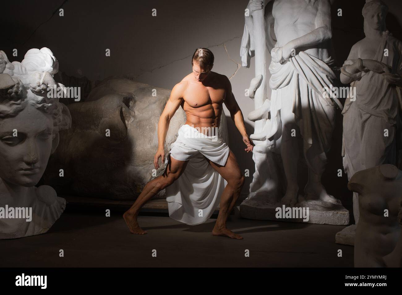 A muscular man in a tunic, antique aesthetics, a bodybuilder among ...