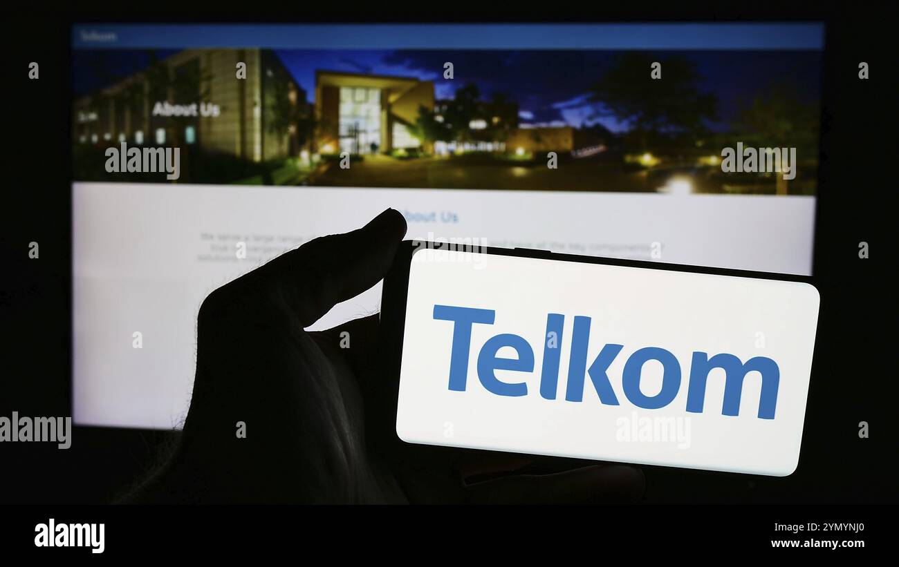 Stuttgart, Germany, 06-11-2024: Person holding smartphone with logo of ...