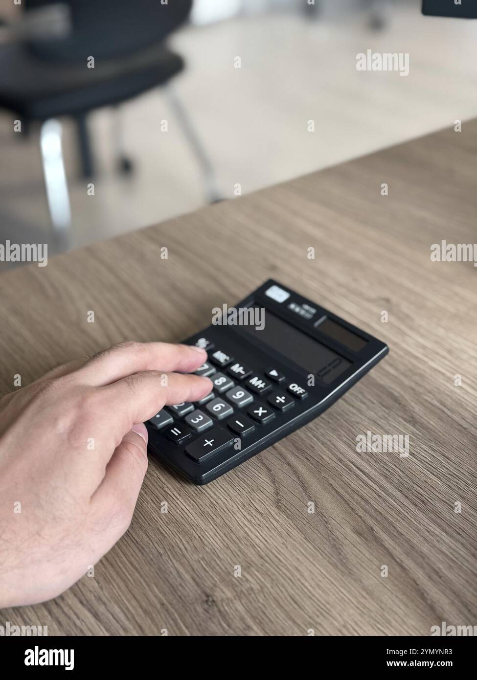 Hand operating calculator hi-res stock photography and images - Alamy