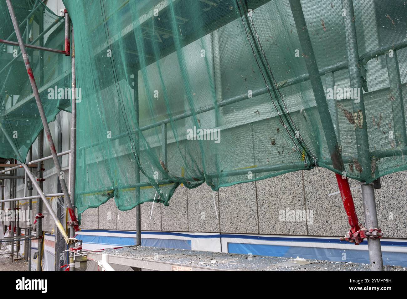 House construction site covered with a tarpaulin Stock Photo - Alamy