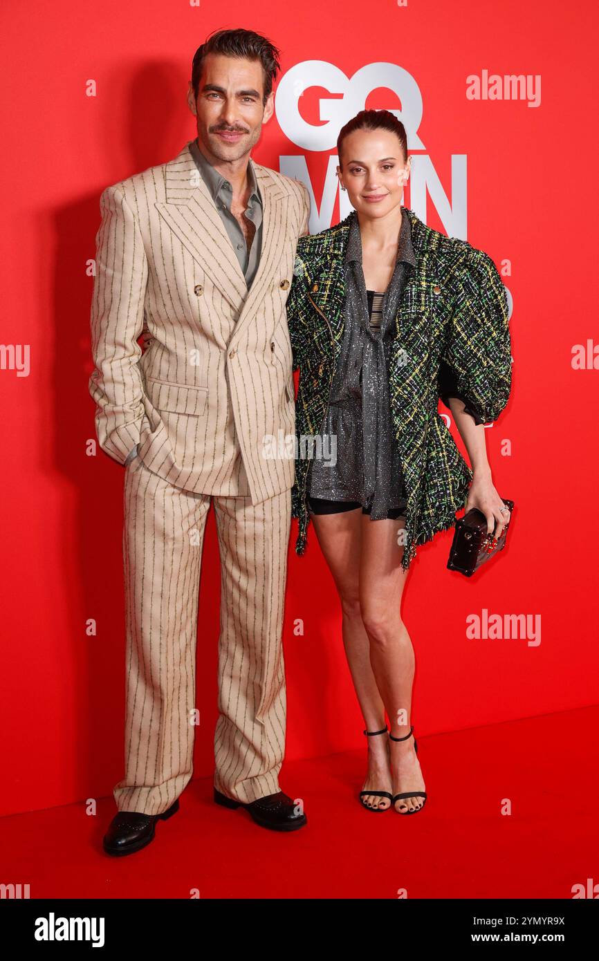Alicia Vikander and Jon Kortajarena attend the GQ Men Of The Year 2024 ...