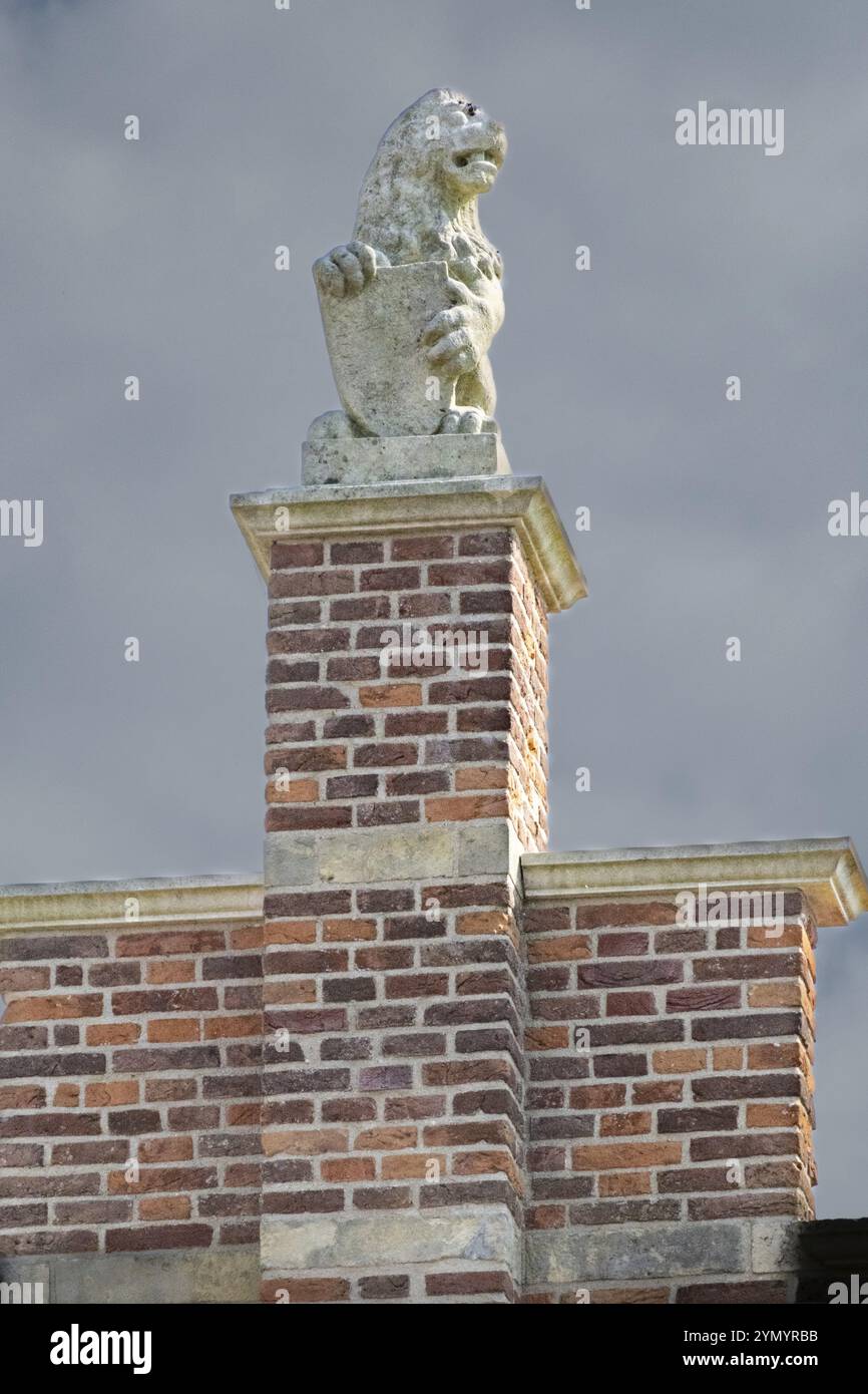 Stone lion on medieval gable and house roof in the netherlands Stock ...