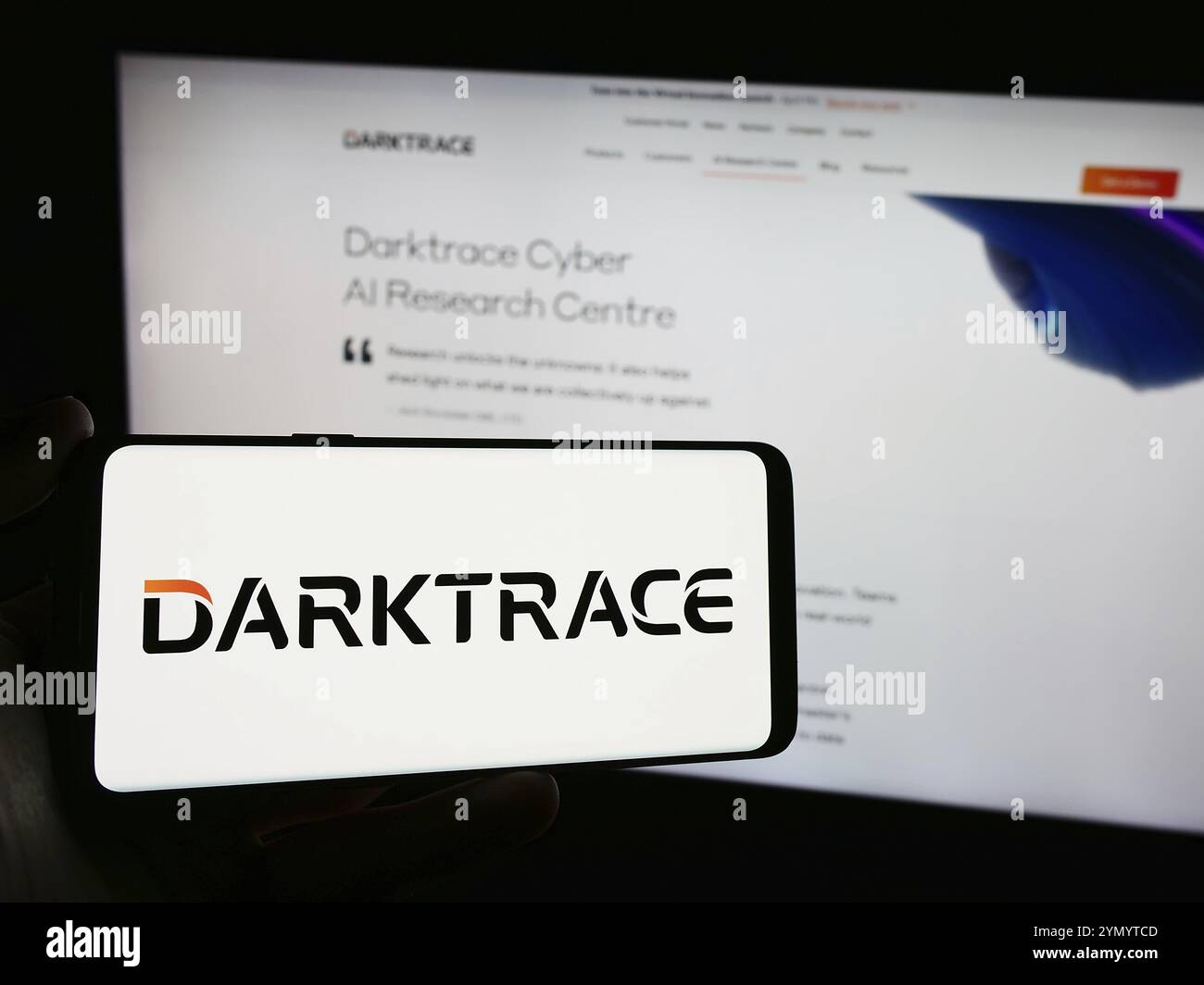 Stuttgart, Germany, 03-17-2024: Person holding mobile phone with logo of British cyber security ...