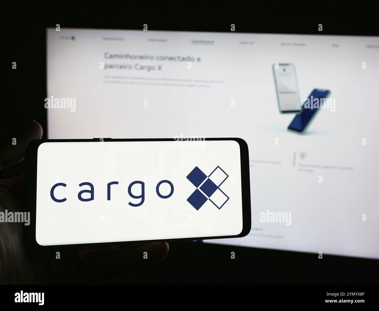 Stuttgart, Germany, 06-06-2024: Person holding smartphone with logo of Brazilian logistics ...