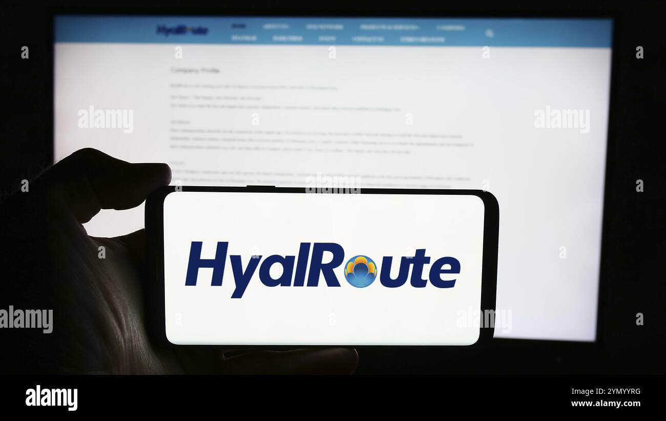 Stuttgart, Germany, 06-01-2024: Person holding cellphone with logo of ...