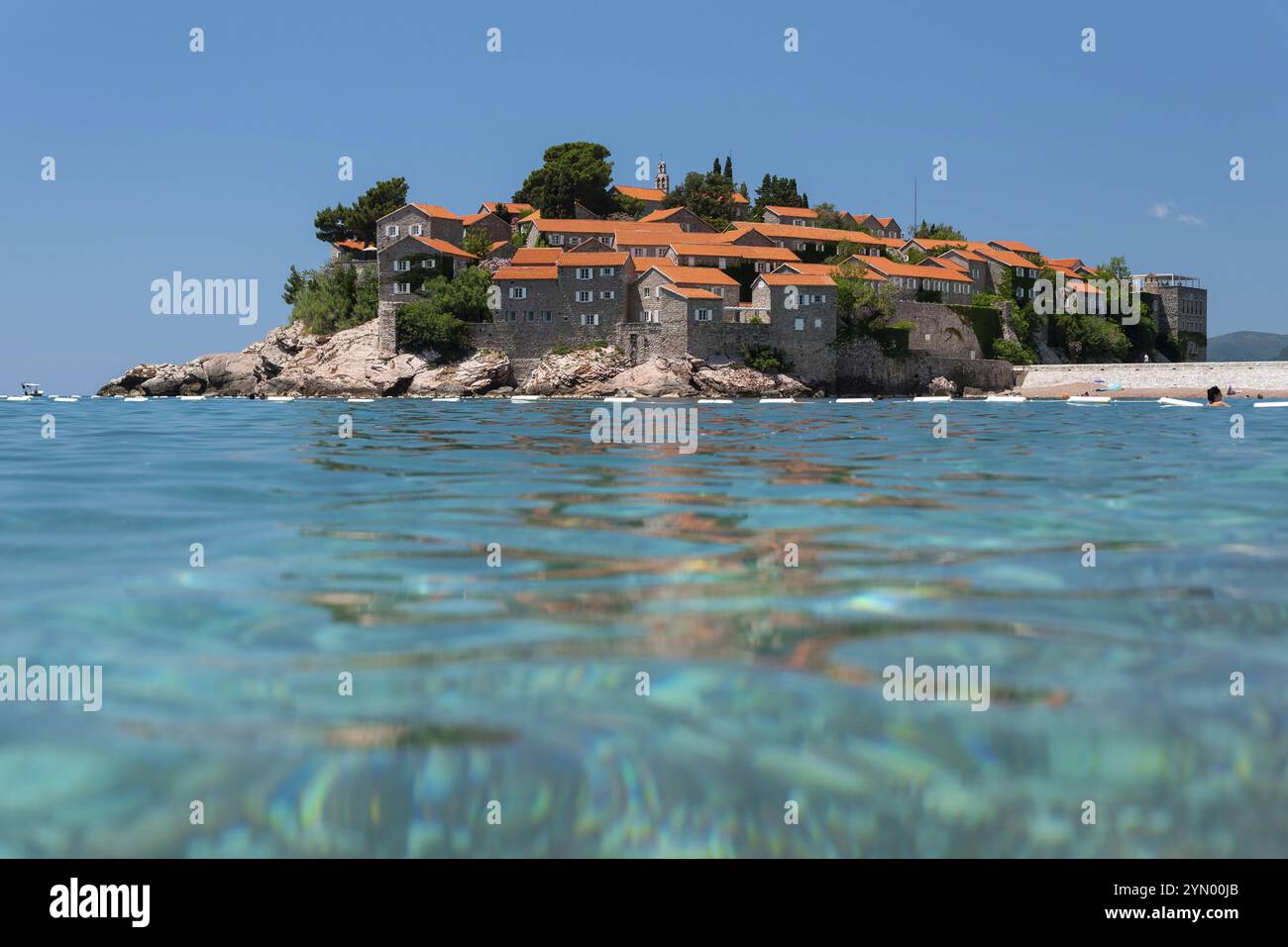 Sveti Stefan island during beautiful summer day, Montenegro Stock Photo ...