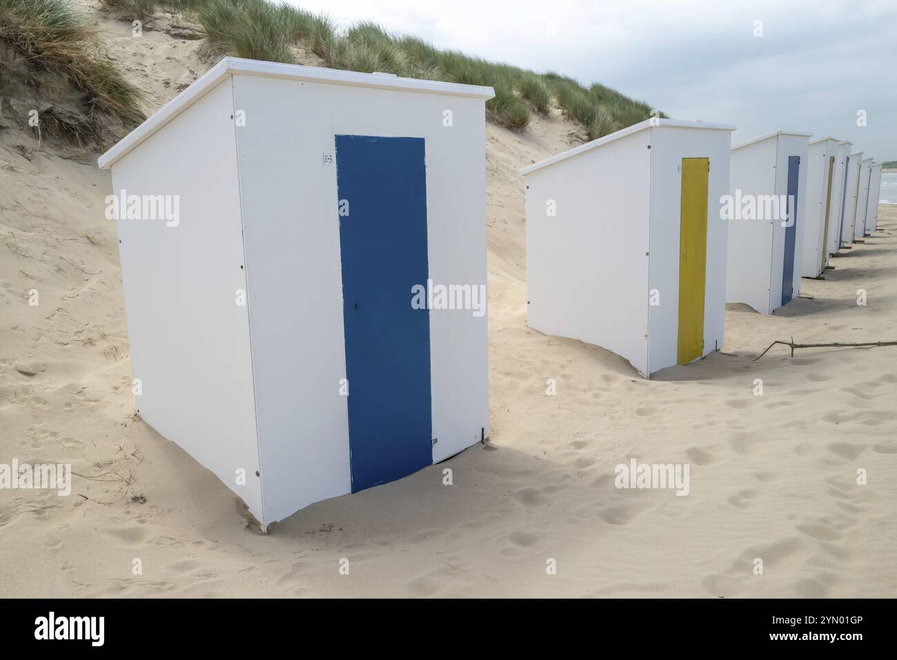 Colorful changing cabins on the beach Stock Photo - Alamy