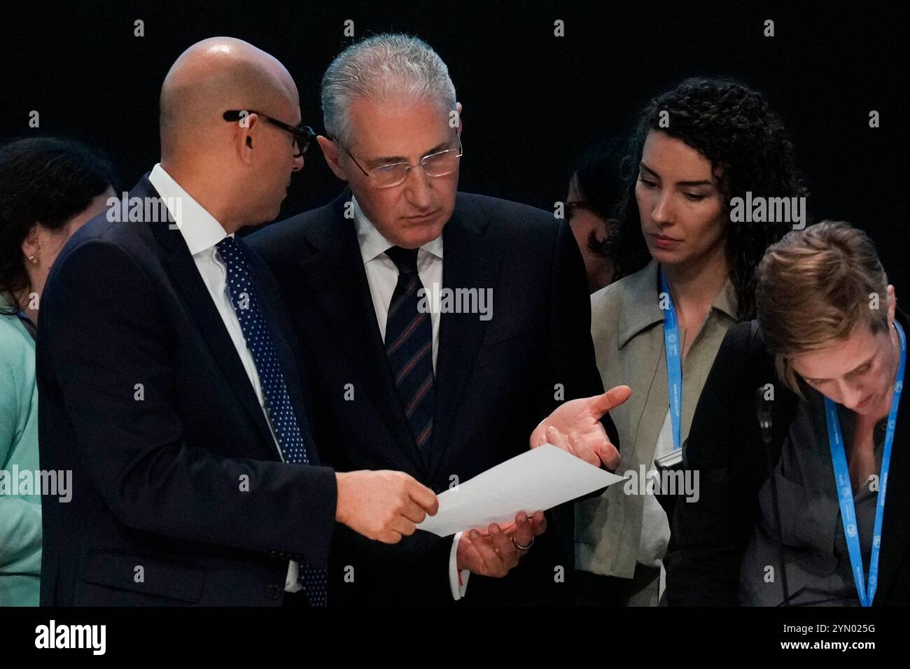 Simon Stiell, United Nations climate chief, left, and Mukhtar Babayev, COP29 President, center ...