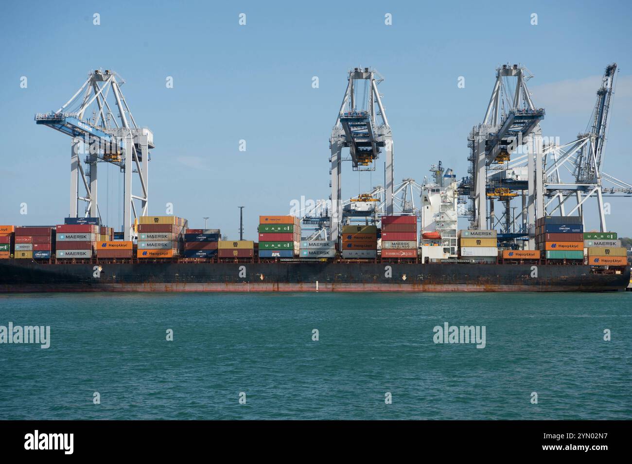 Container ship being loaded (or unloaded) in Auckland, New Zealand ...