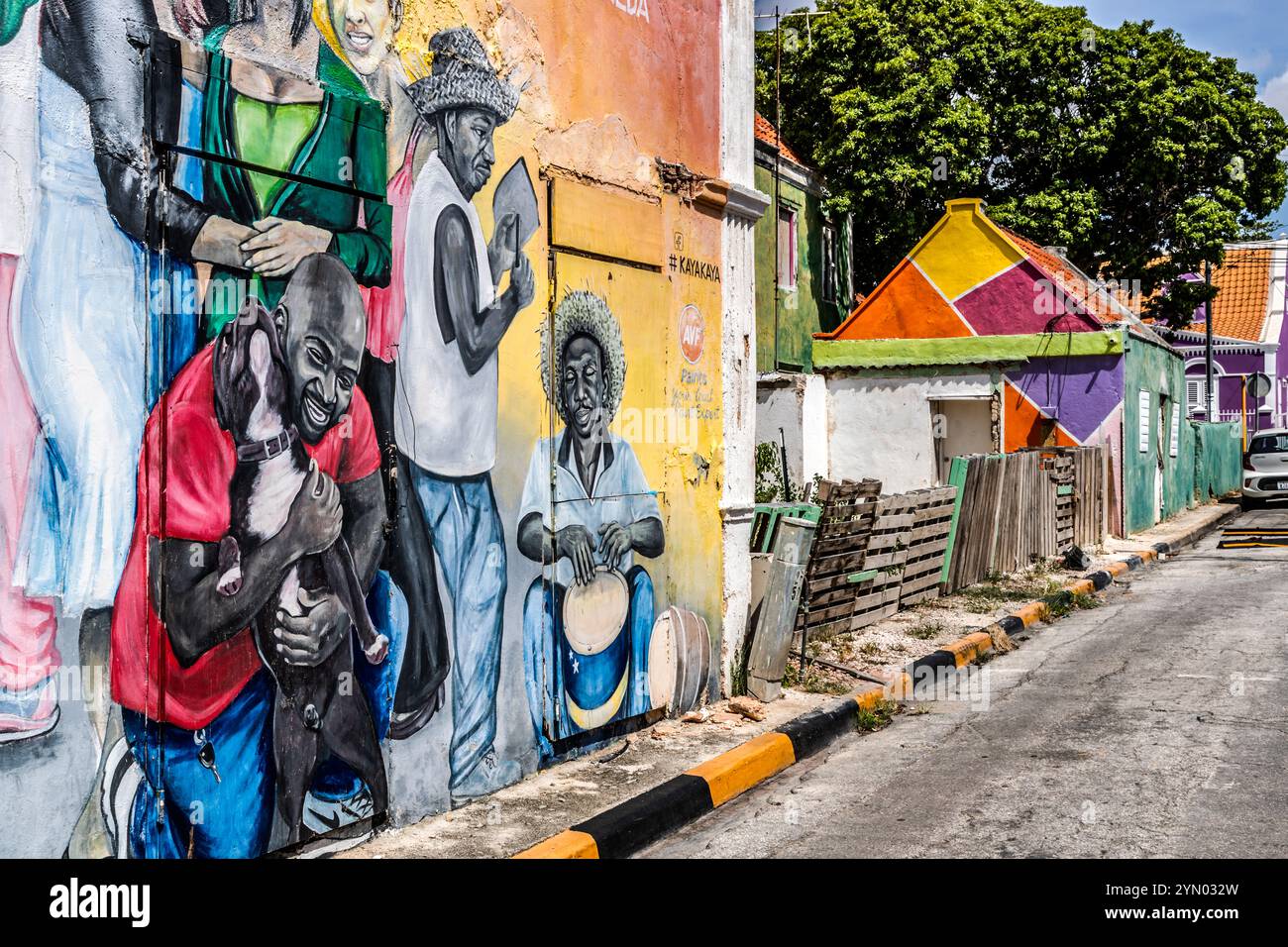 Mural by Melvin House in collaboration with Jhomar Loaiza. The sentence ...