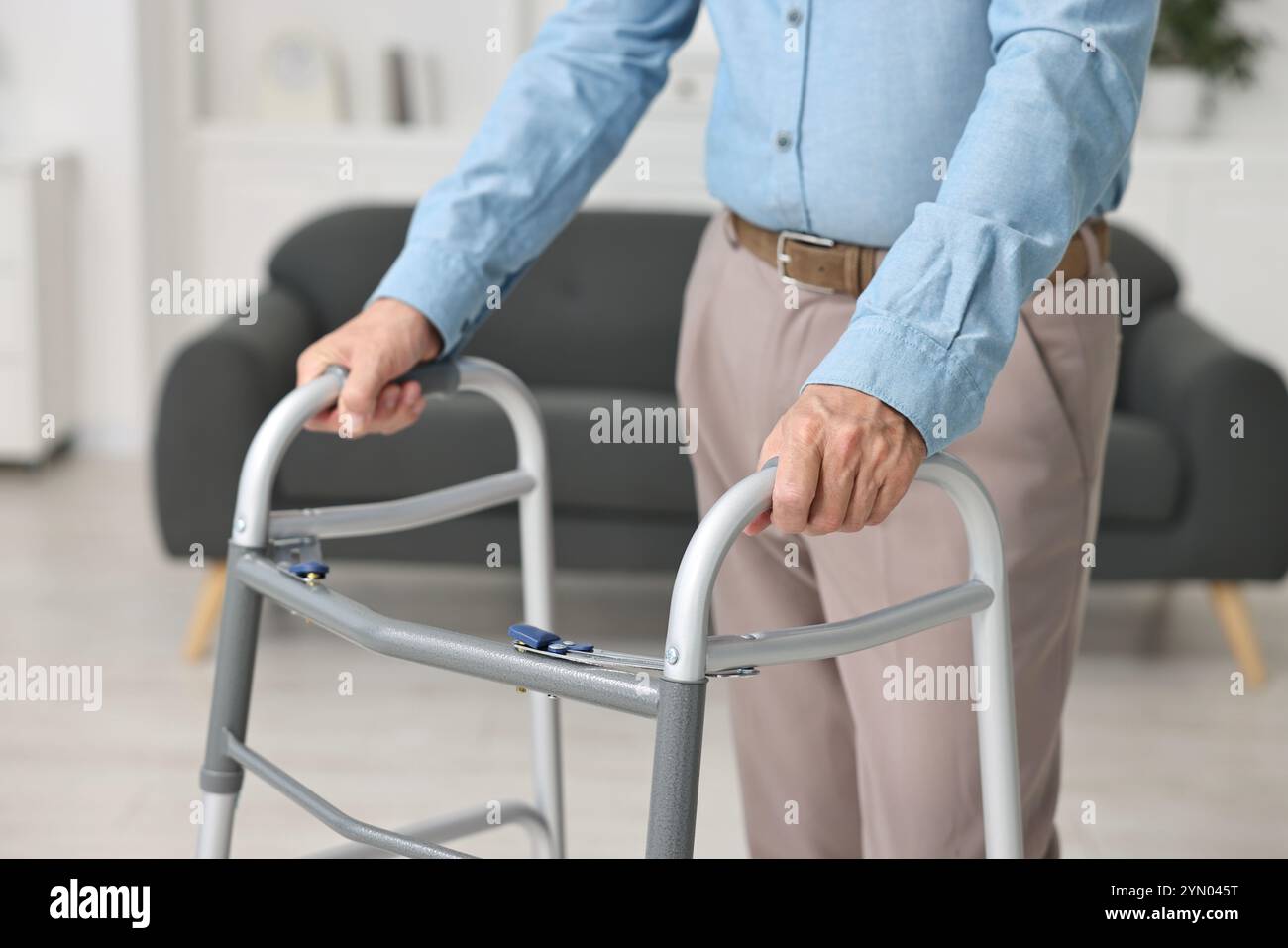 Old man using walker hi-res stock photography and images - Alamy