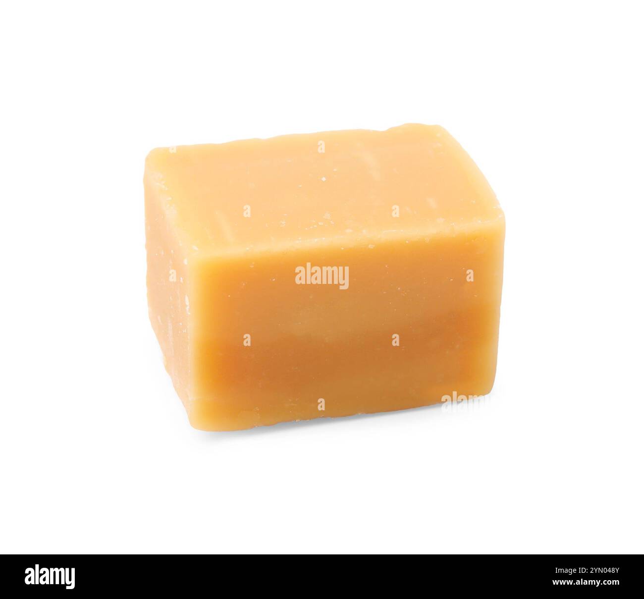 One tasty sweet caramel candy isolated on white Stock Photo - Alamy