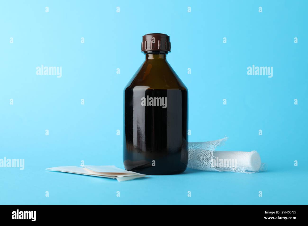 Topical iodine and bandages on light blue background Stock Photo - Alamy