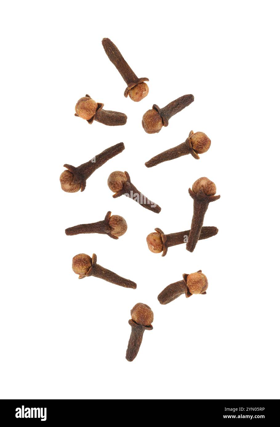 Clove buds in air on white background. Aromatic spice Stock Photo - Alamy