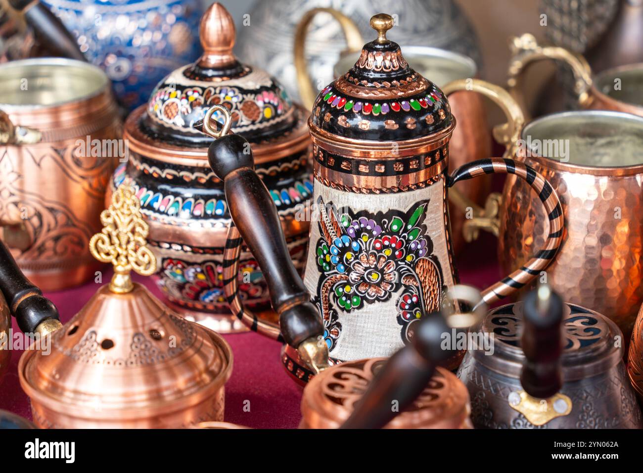 Traditional precious metal coffee set with ornate oriental Turkish ...