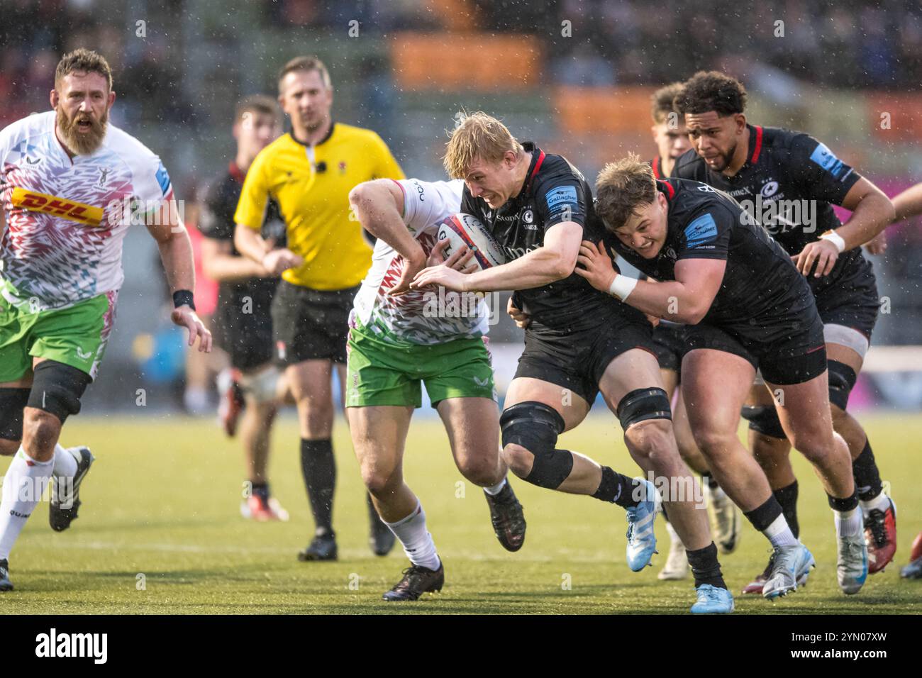 London, UK. 23rd Nov, 2024. Nathan Michelow (c) of Saracens drives the ...