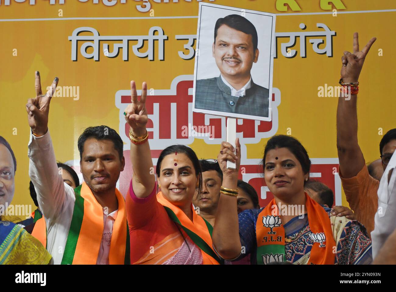 Supporters of Bharatiya Janata Party (BJP) flash victory sign during ...