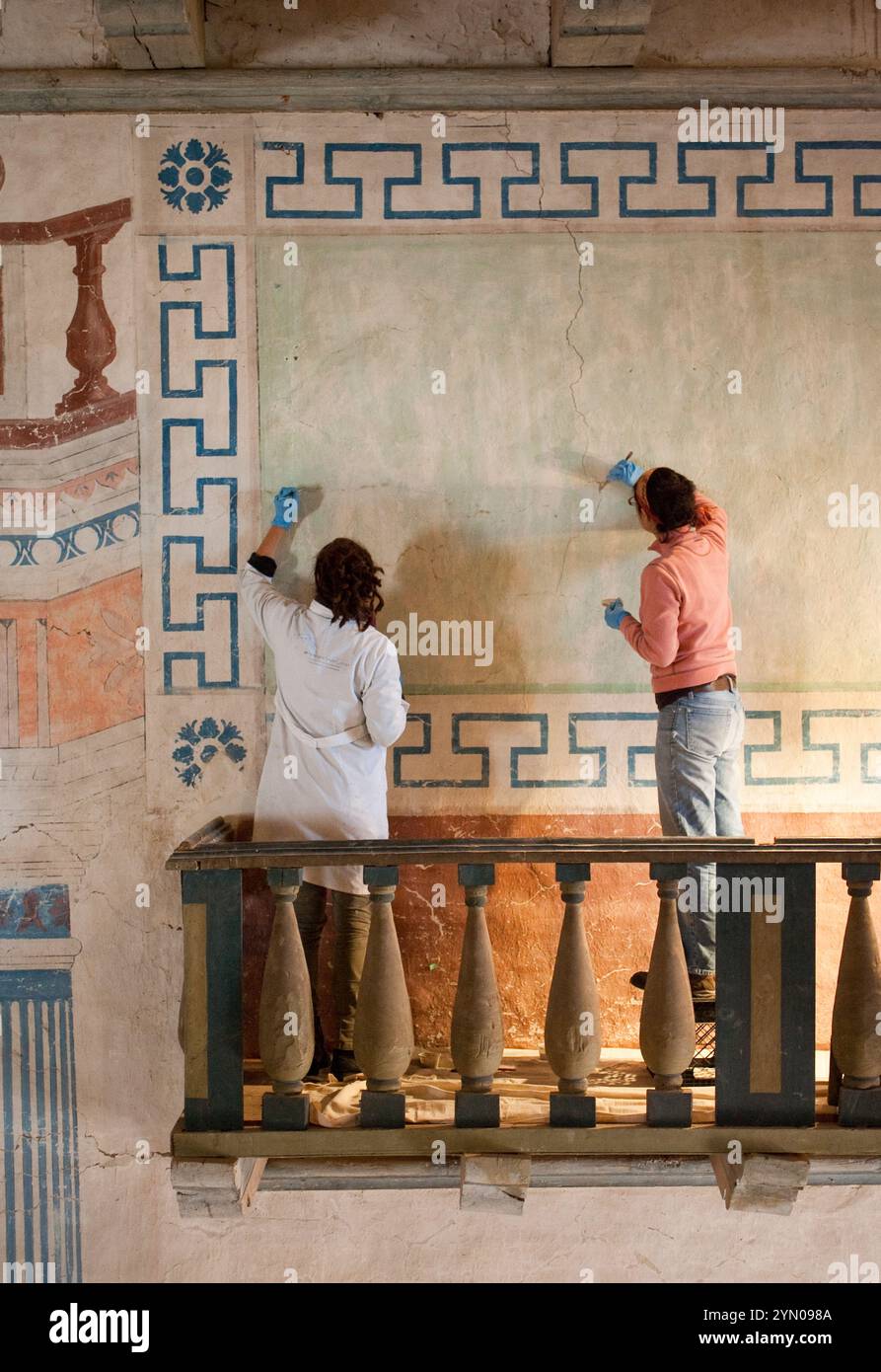 Specialists in art restoration work to repair the nearly 200 year old ...