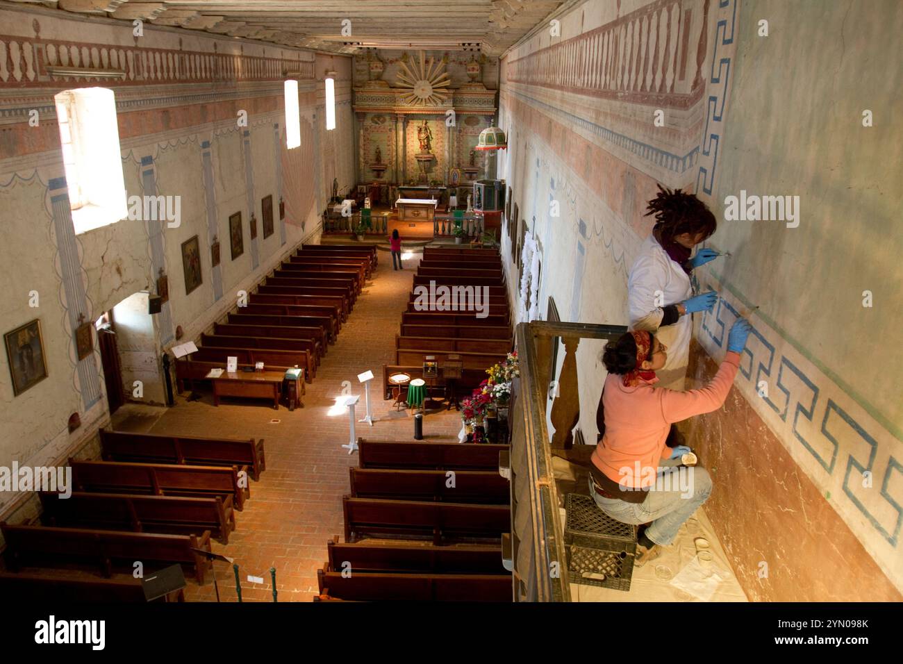 Specialists in art restoration work to repair the nearly 200 year old ...