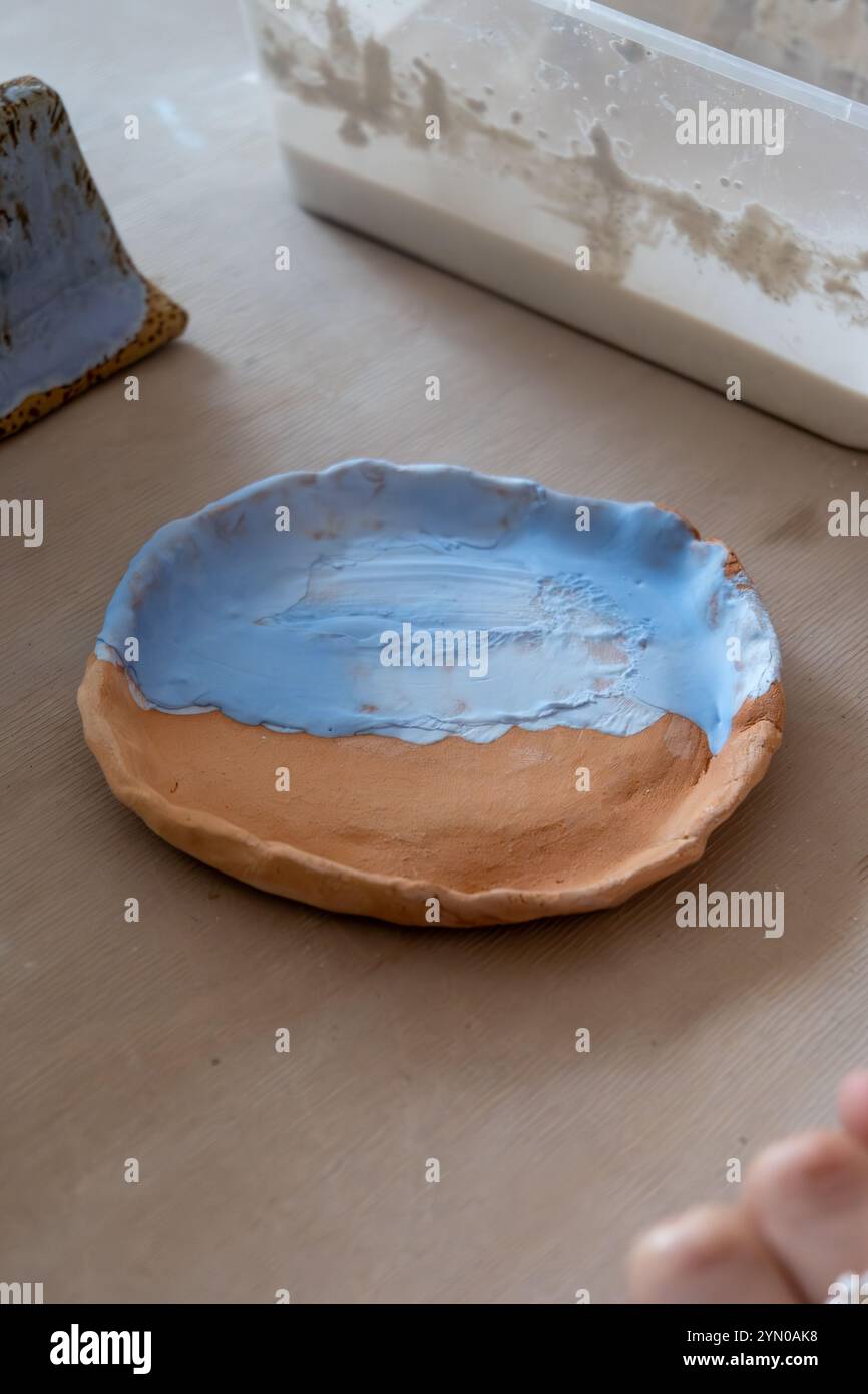 Samples of ceramic art objects and tabelware made on workshop in art ...