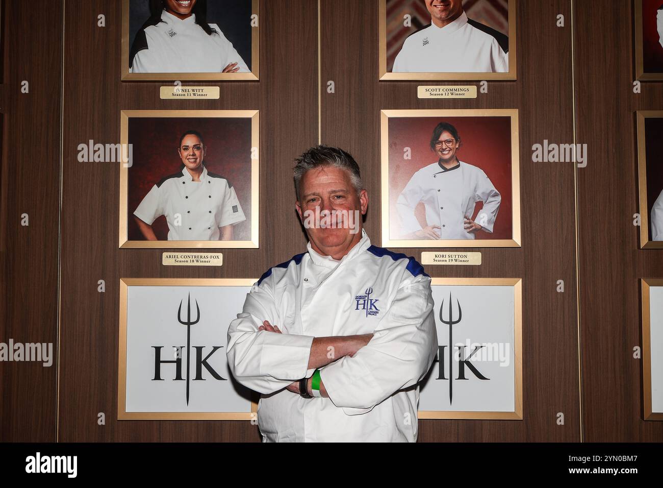 Las Vegas, NV, USA. 23rd Nov, 2024. Keith from Toronto (C) poses for a ...