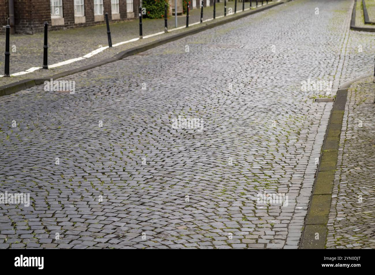 Old cobbled street with pavement in germany Stock Photo - Alamy