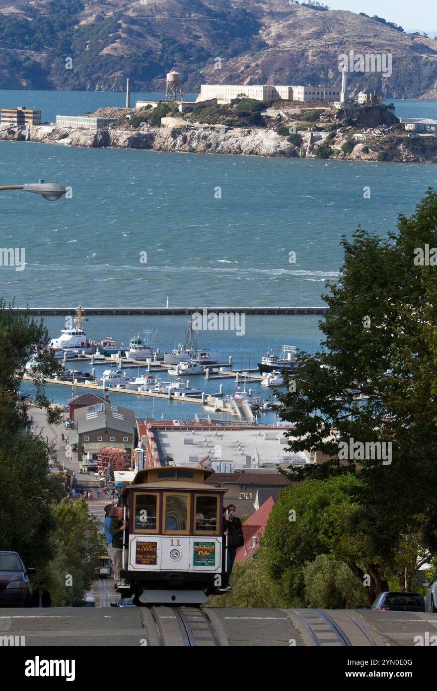 Riders on San Francisco's famous cable cars Stock Photo - Alamy