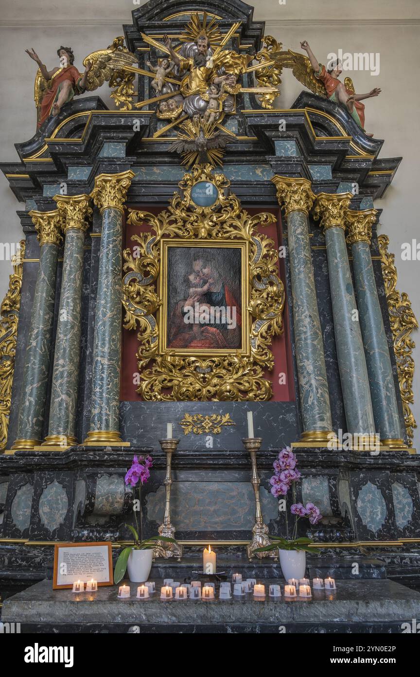 Side altar with sacrificial candles, Former collegiate church of St ...
