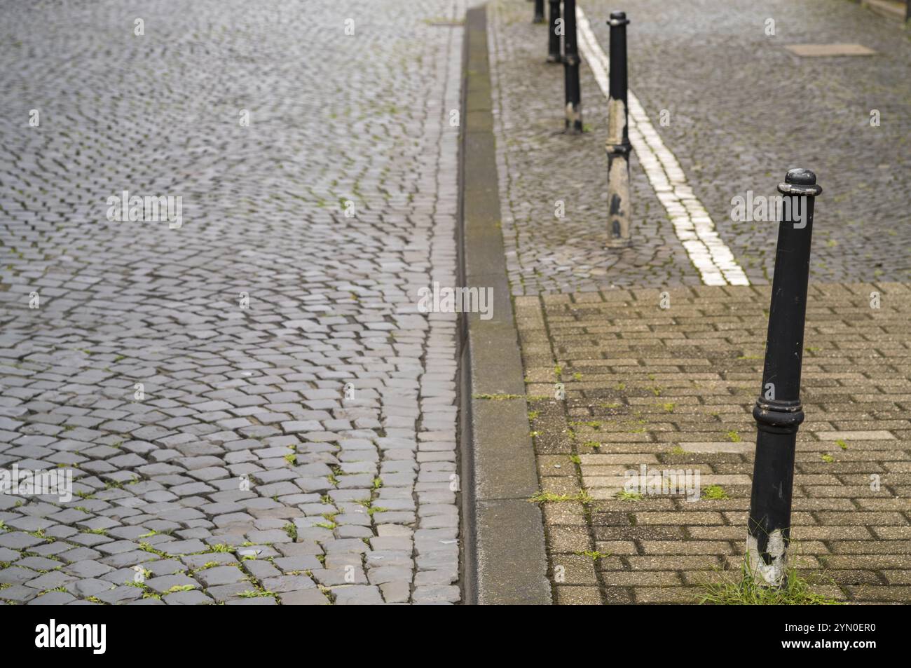 Old cobbled street with pavement in germany Stock Photo - Alamy