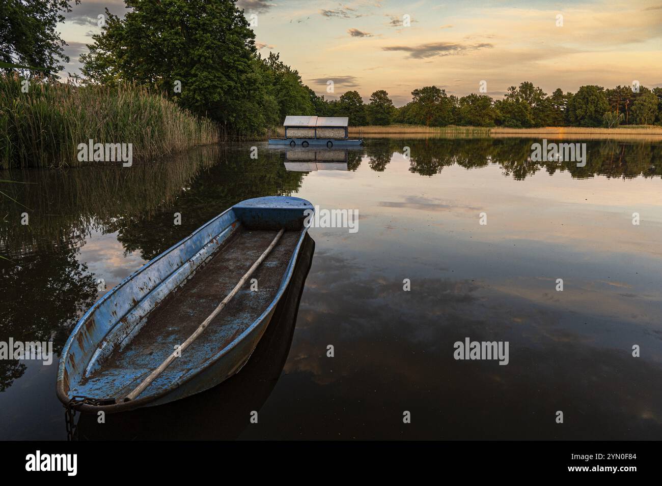 Pond boats for fishing hi-res stock photography and images - Alamy