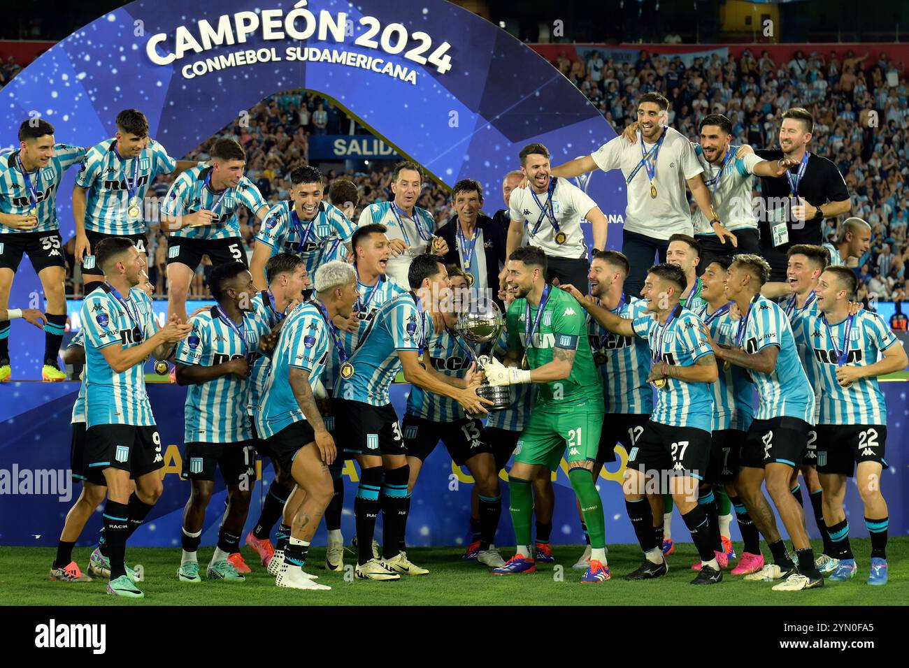 Argentina's Racing Club players celebrate with the trophy after ...