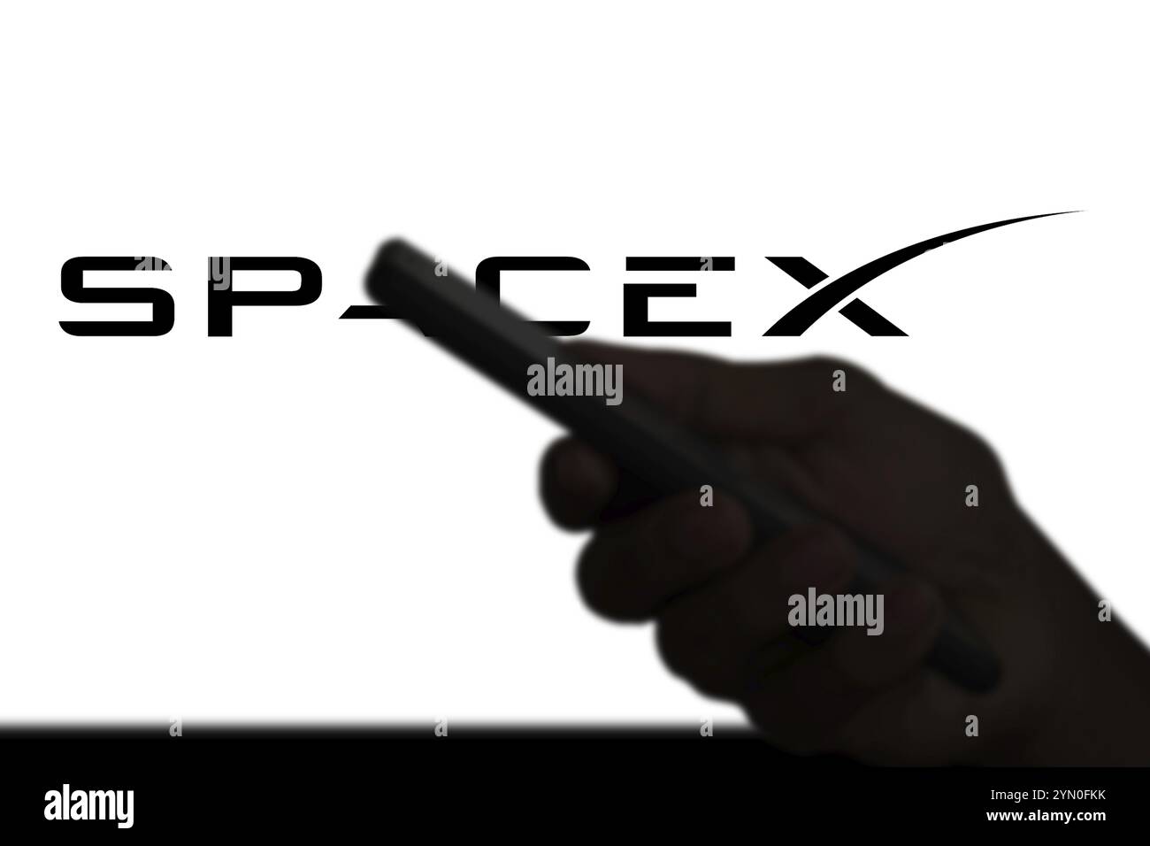 SpaceX logo on smartphone screen. SpaceX is an American aerospace ...